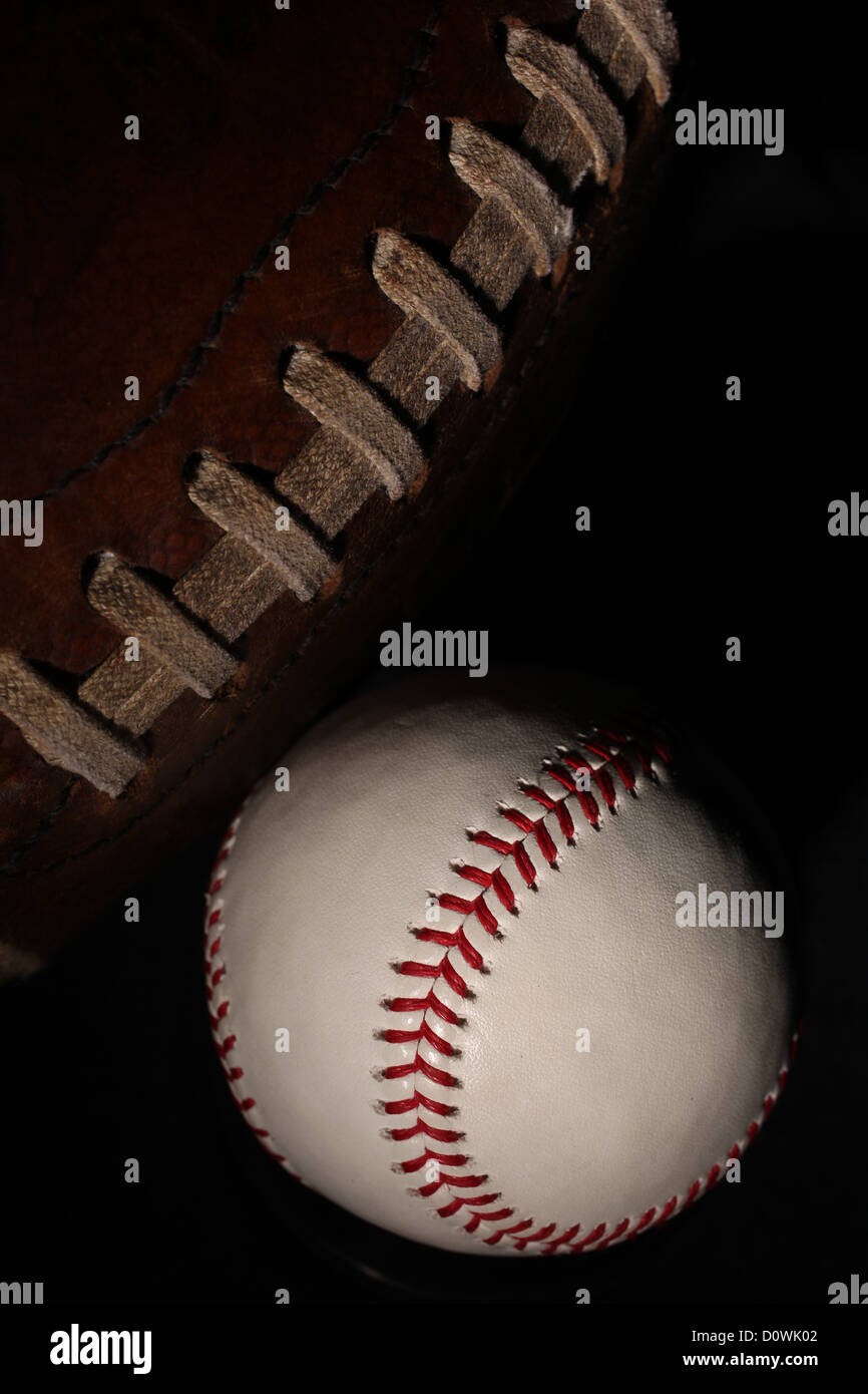 A studio shot of an American Football and a baseball Stock Photo - Alamy