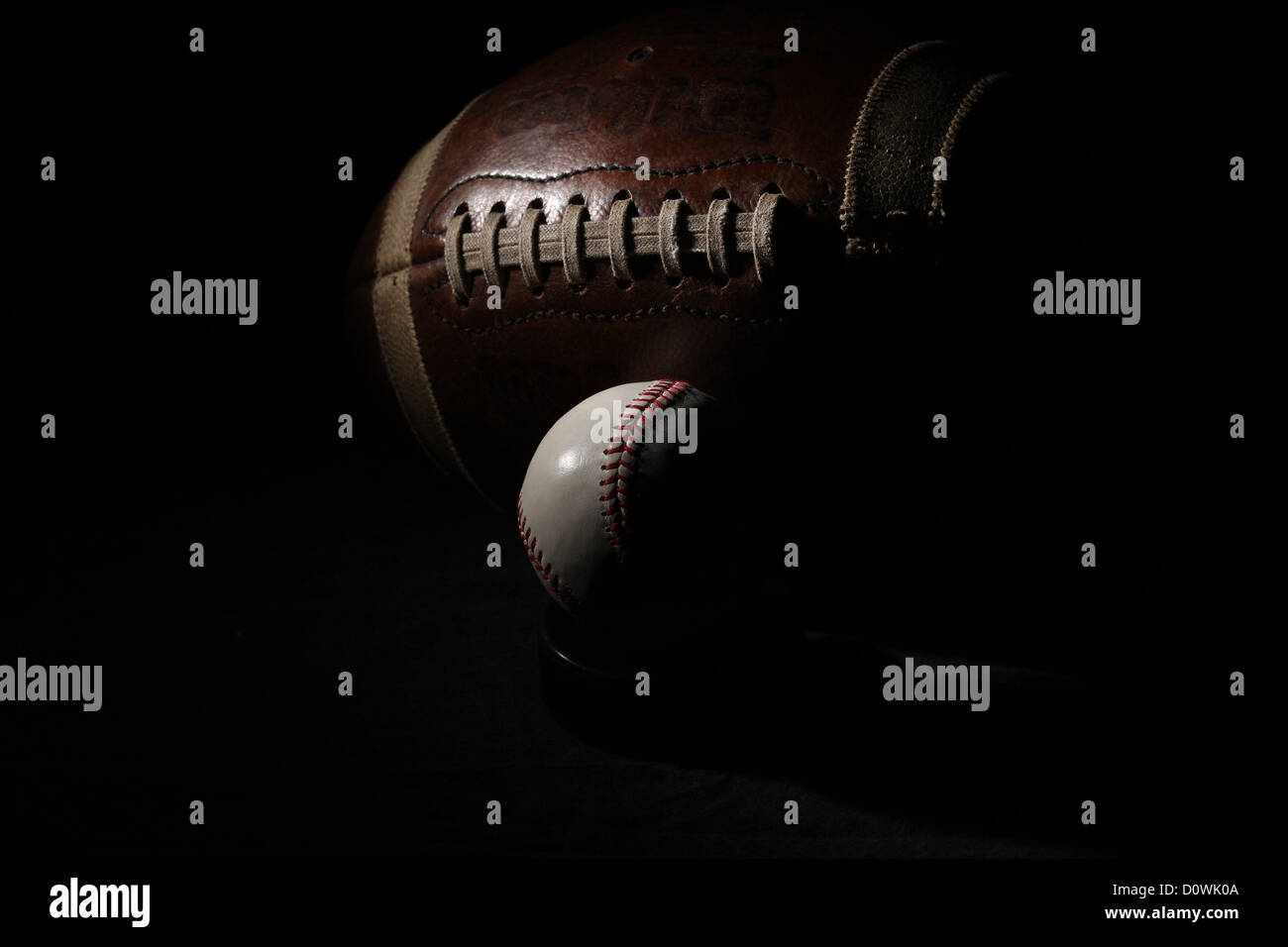 A studio shot of an American Football and a baseball Stock Photo - Alamy