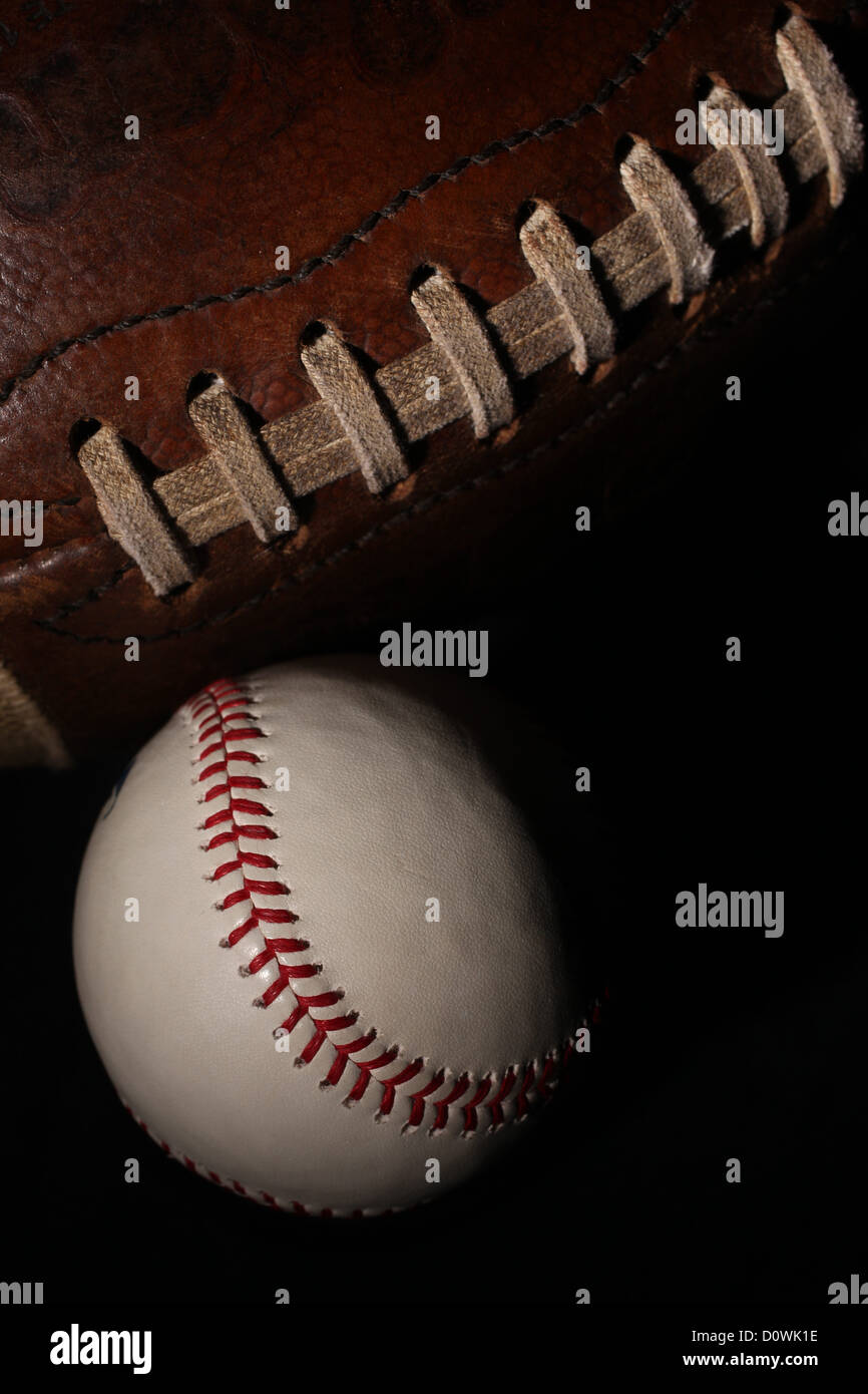 A studio shot of an American Football and a baseball Stock Photo - Alamy