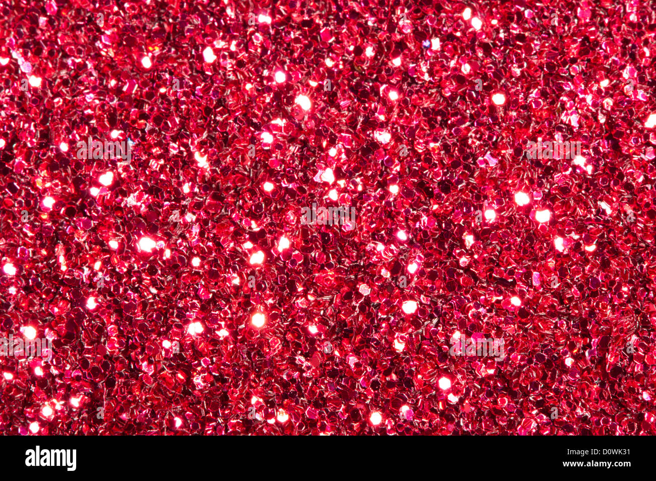 Holiday red shiny background. Shiny particles in red colors Stock Photo ...