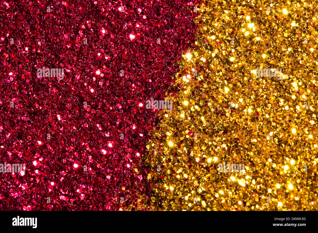 Holiday yellow and red shiny background. Shiny particles in yellow and ...