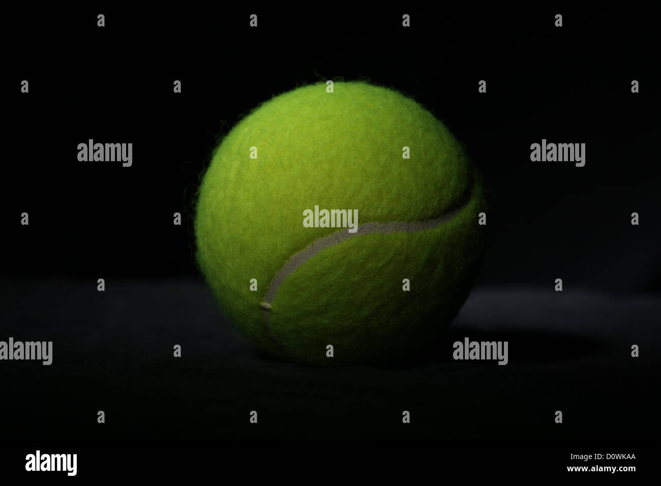 A tennis ball and tennis racquet Stock Photo - Alamy