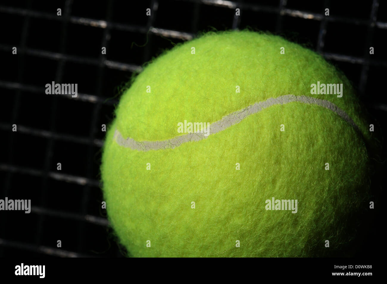 A tennis ball and tennis racquet Stock Photo - Alamy