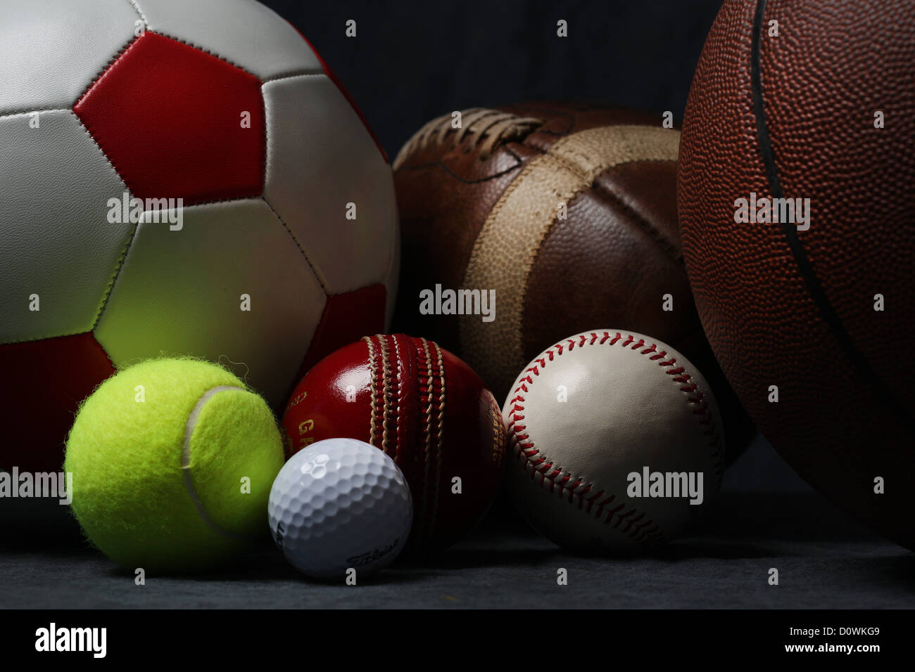 A studio shot of a Baseball, a Basketball an American Football, a ...