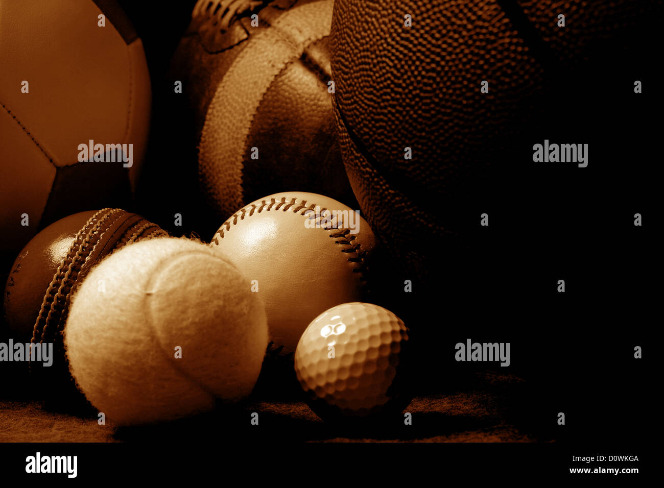 A studio shot of a Baseball, a Basketball an American Football, a ...