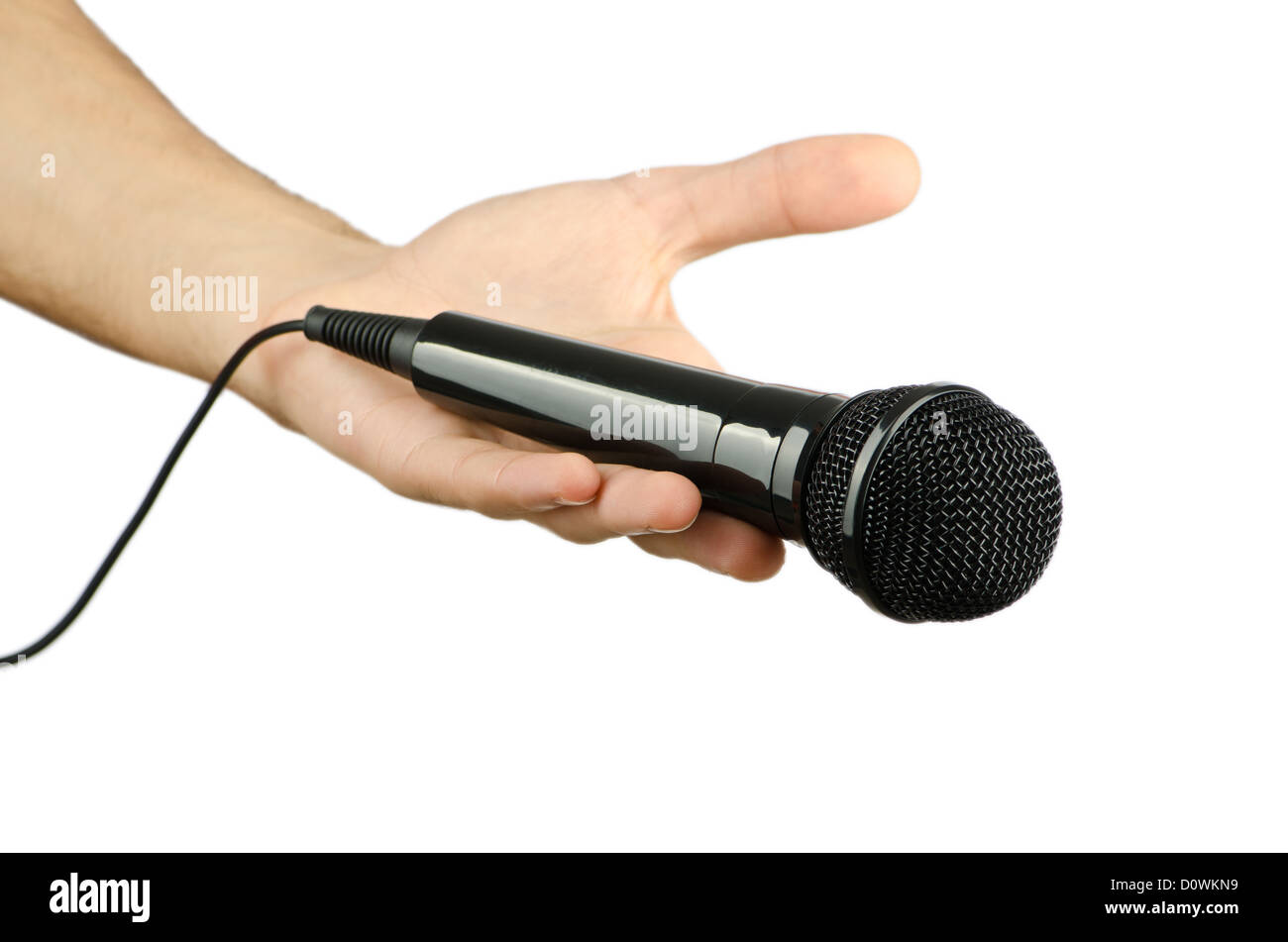 Hand holding microphone on white Stock Photo - Alamy