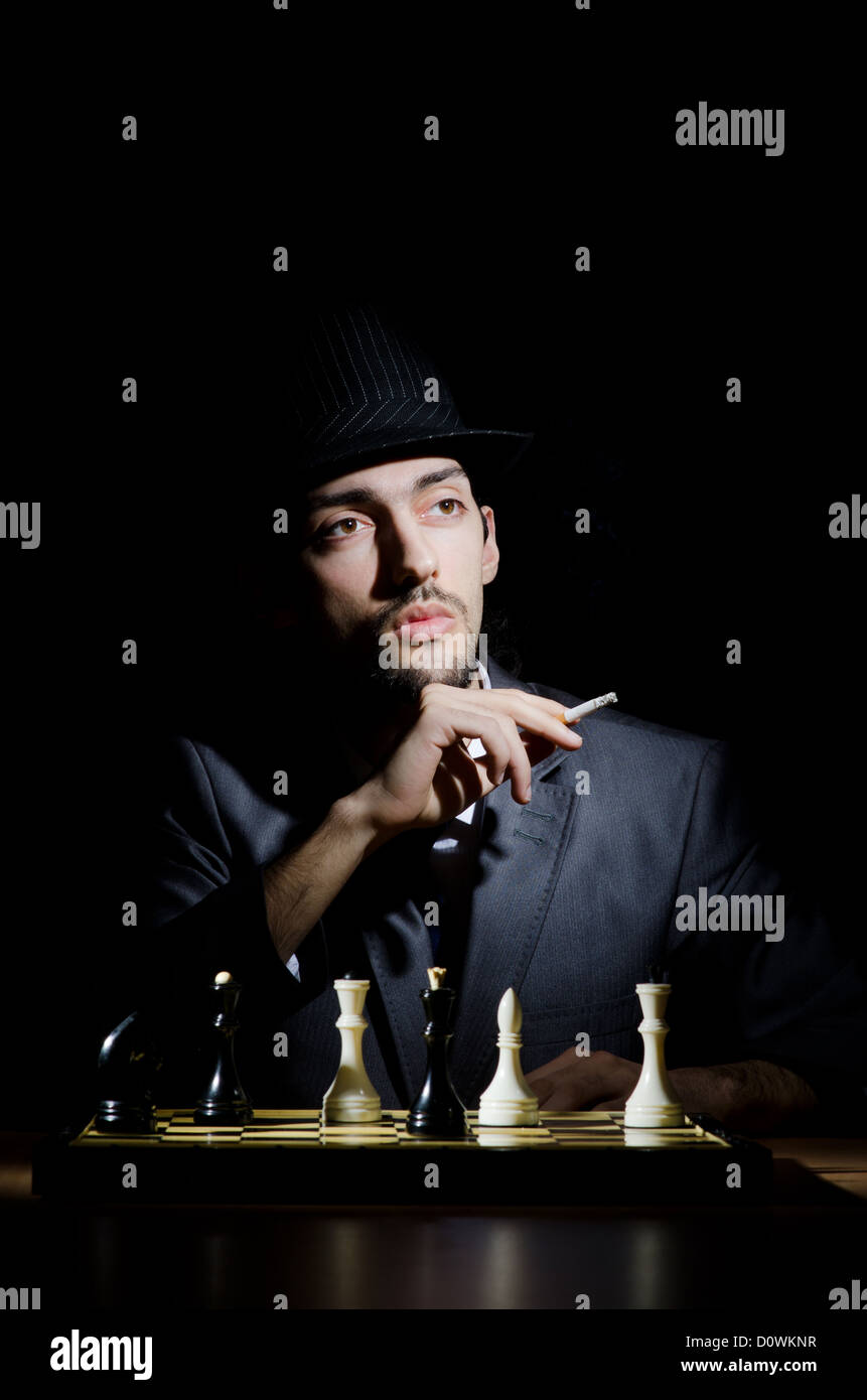 Chess player playing his game Stock Photo - Alamy