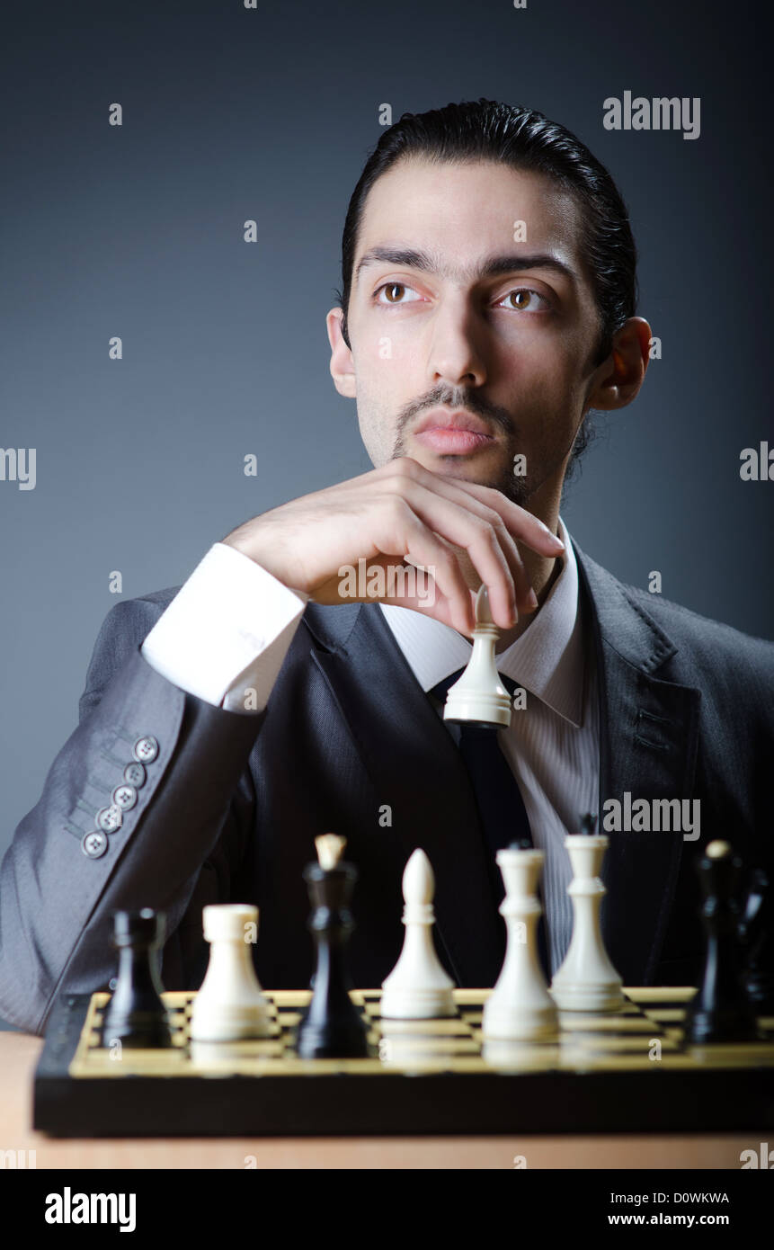 Chess player playing his game Stock Photo - Alamy
