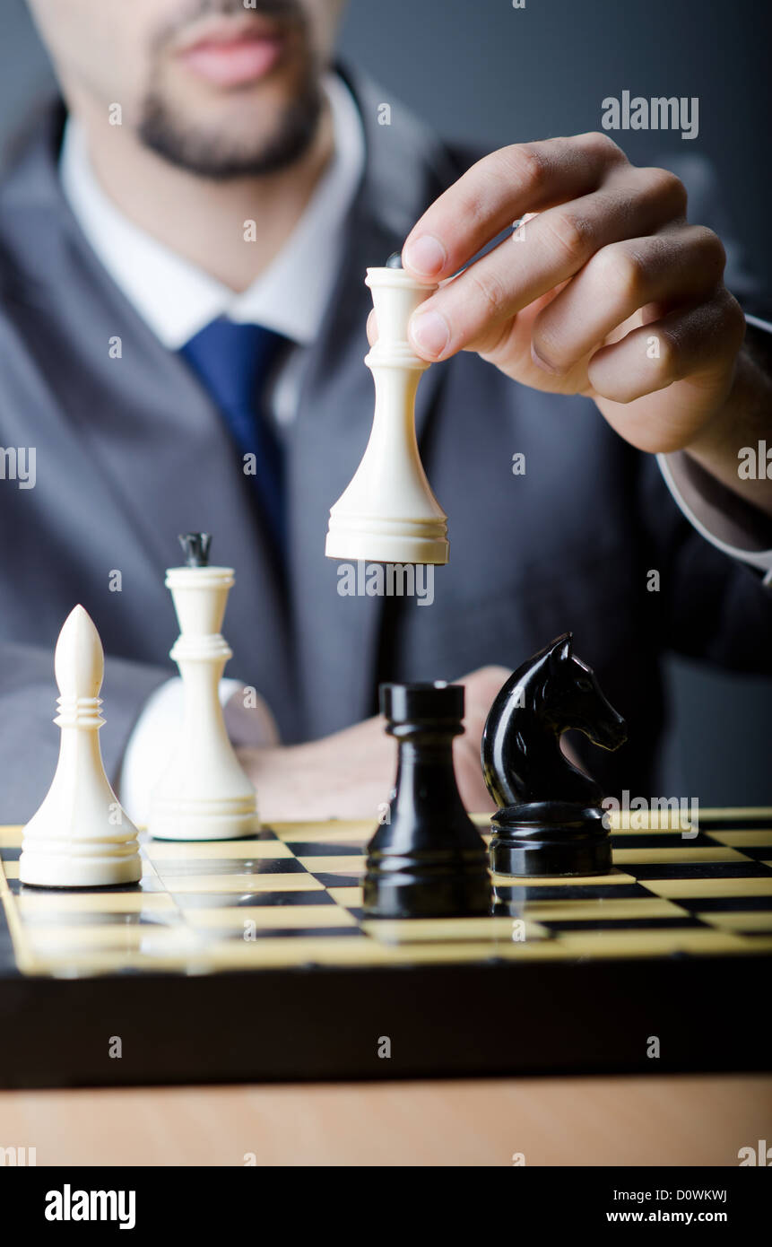 Chess player playing his game Stock Photo - Alamy