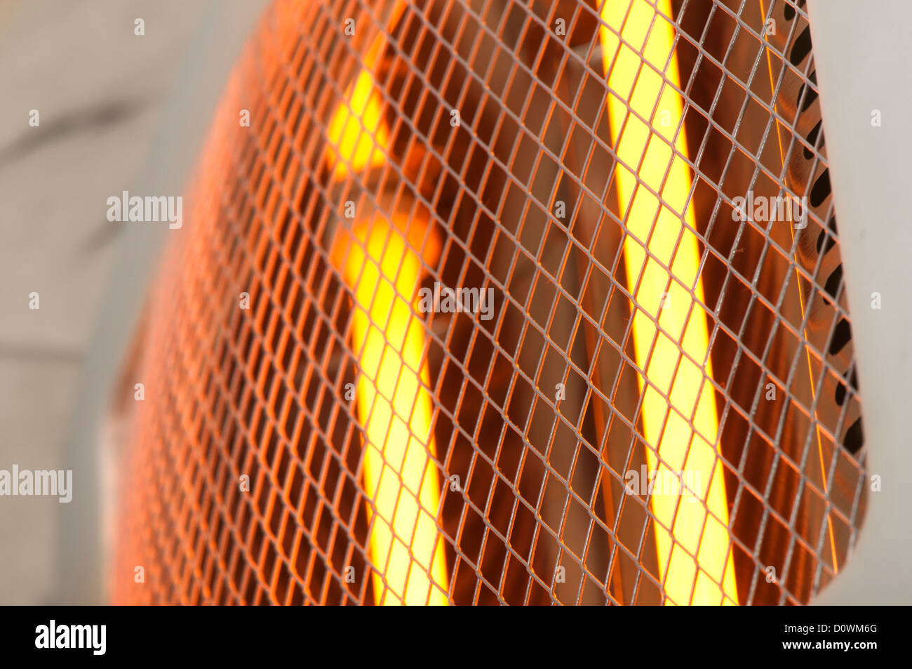 Electric heater with halogen coils close up. Luminous halogen coils ...