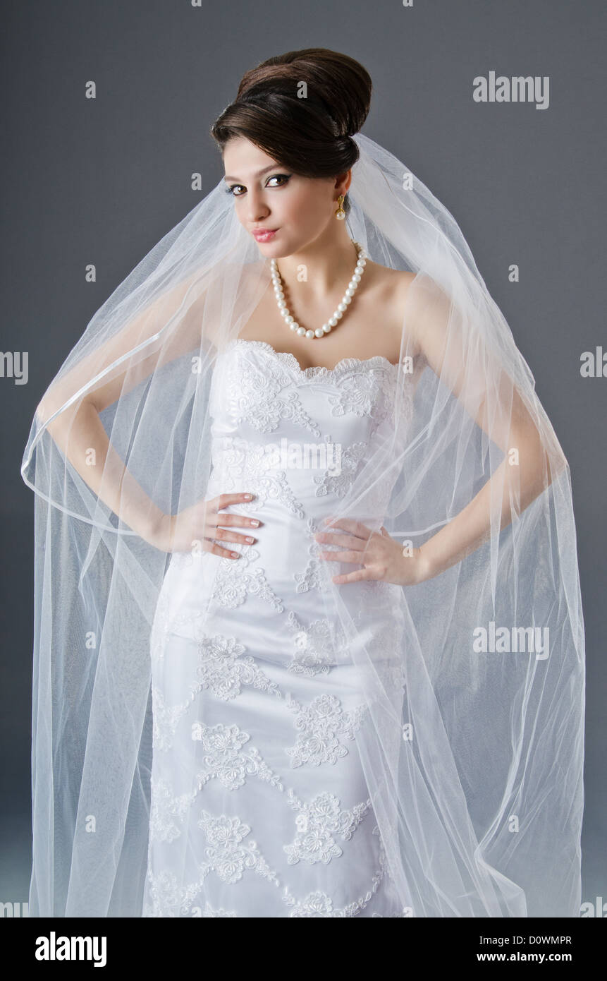 Bride in wedding dress in studio shooting Stock Photo - Alamy