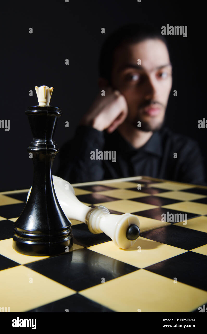 Chess player playing his game Stock Photo - Alamy