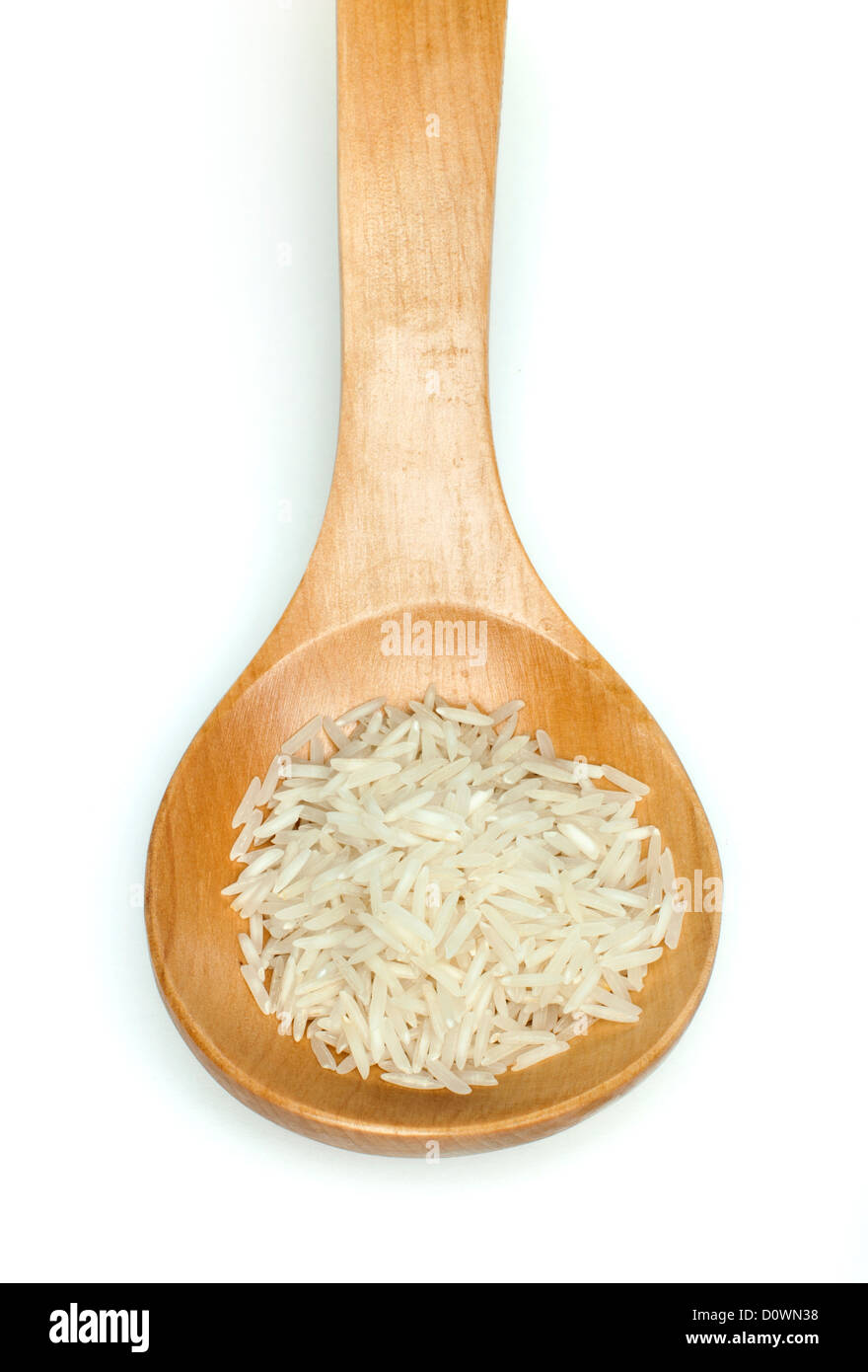 Basmati rice in wooden spoon on white background Stock Photo - Alamy