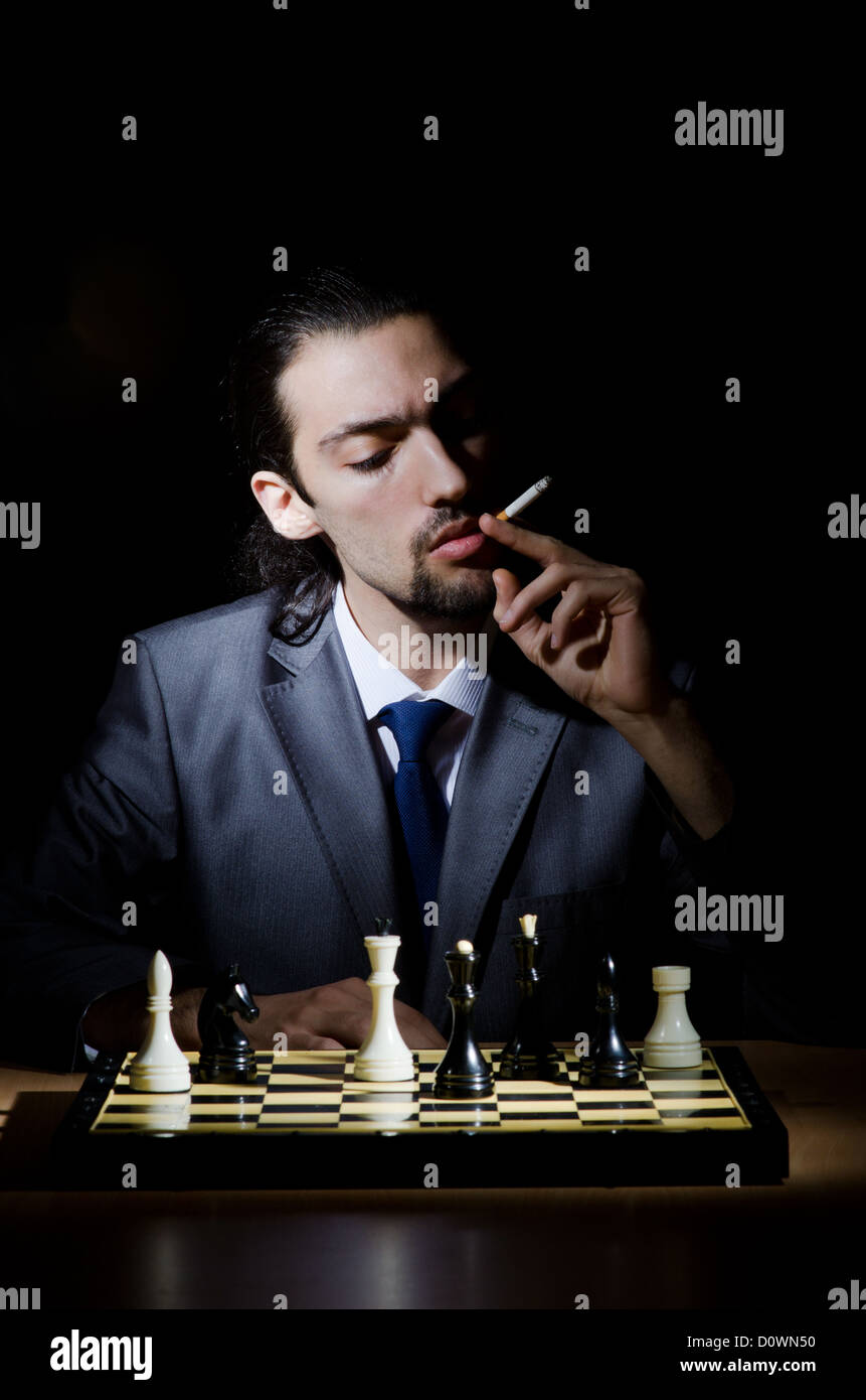 Chess player playing his game Stock Photo - Alamy