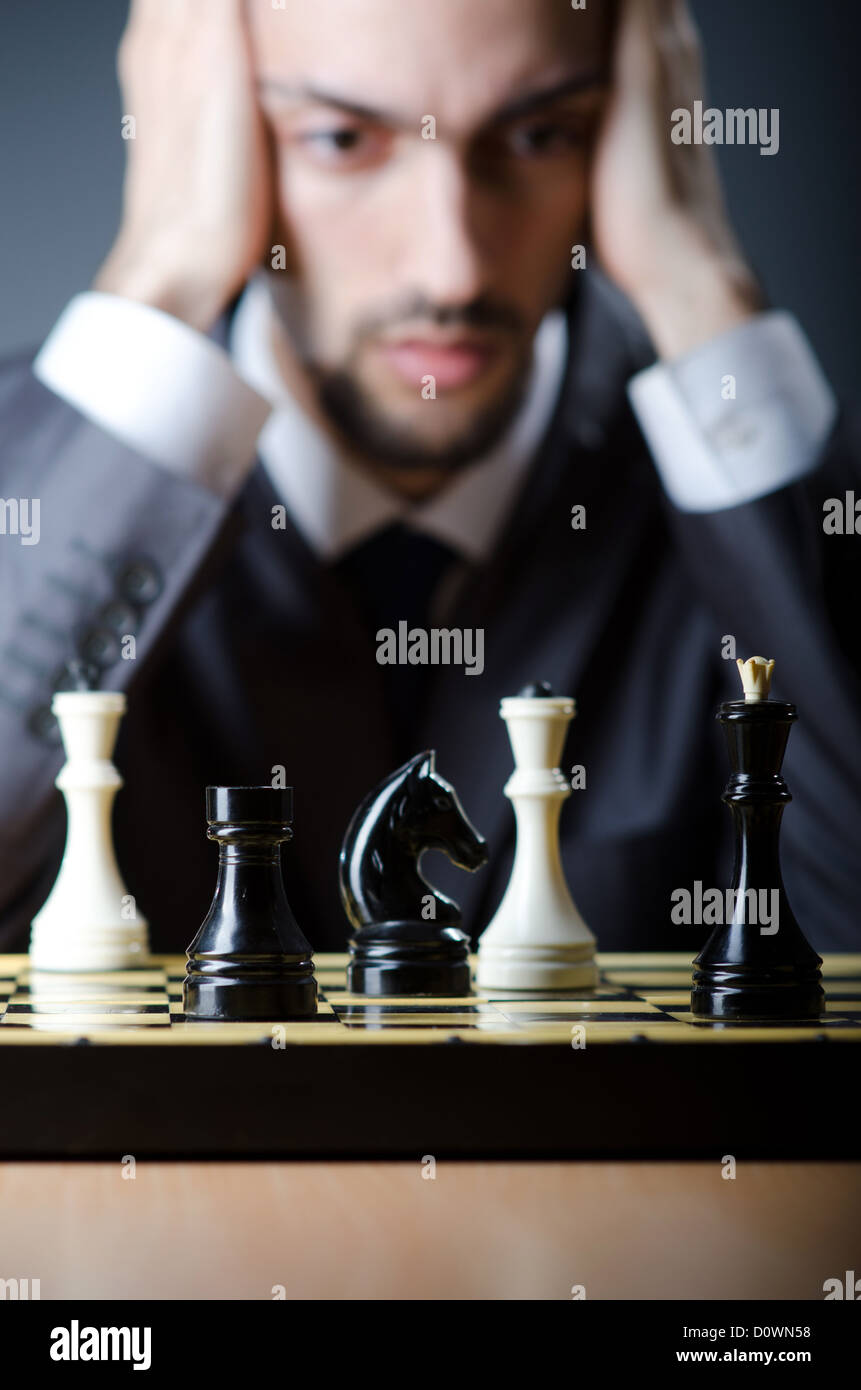 Chess player playing his game Stock Photo - Alamy