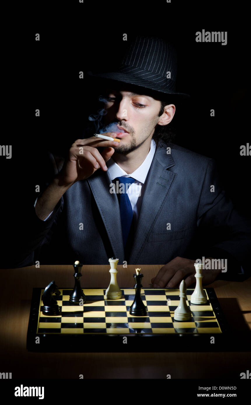 Chess player playing his game Stock Photo - Alamy