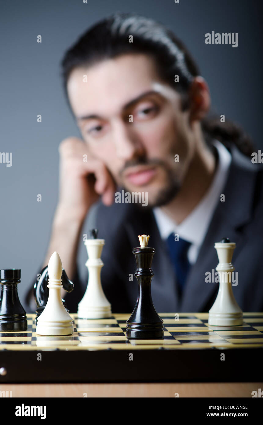 Chess player playing his game Stock Photo - Alamy