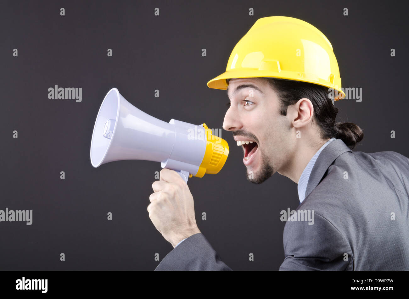 Man shouting and yelling with loudspeaker Stock Photo - Alamy