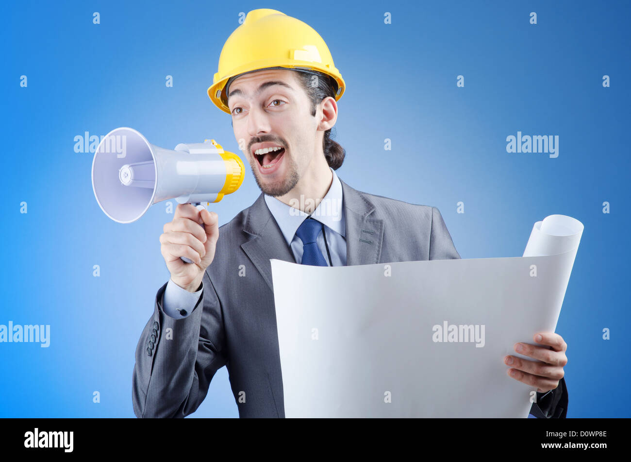 Construction worker shouting via loudspeaker Stock Photo - Alamy