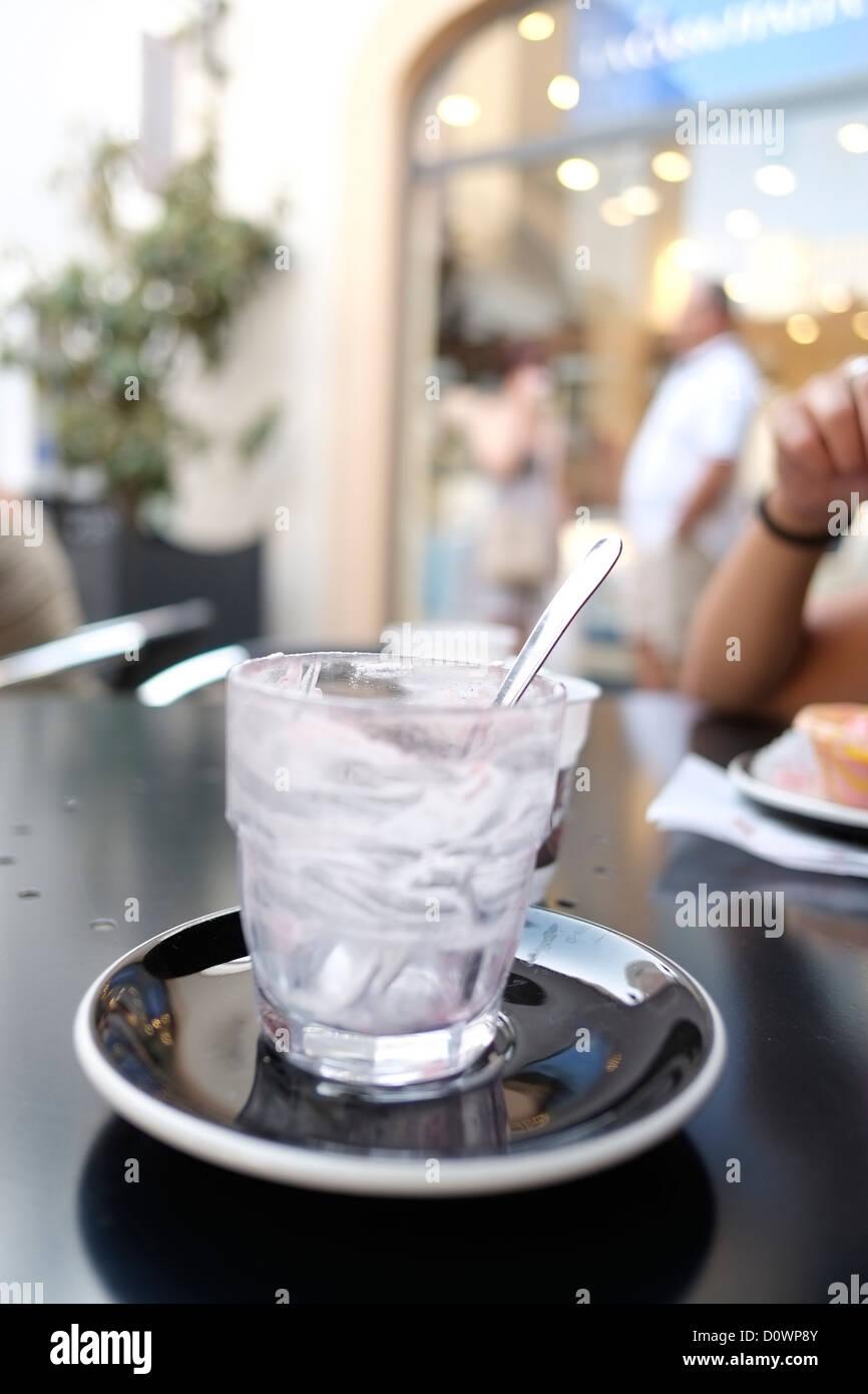 An empty ice-cream glass on bar table Stock Photo - Alamy
