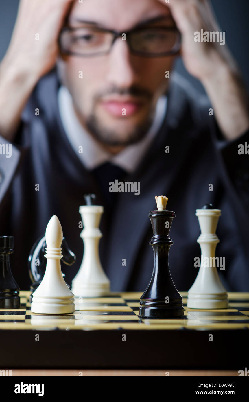 Chess player playing his game Stock Photo - Alamy