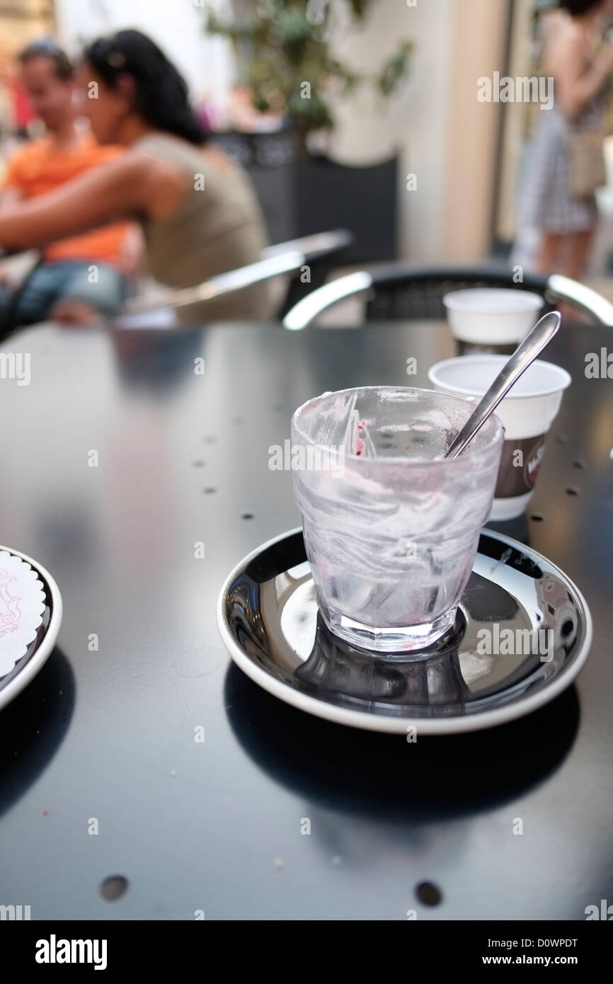 An empty ice-cream glass on bar table Stock Photo - Alamy