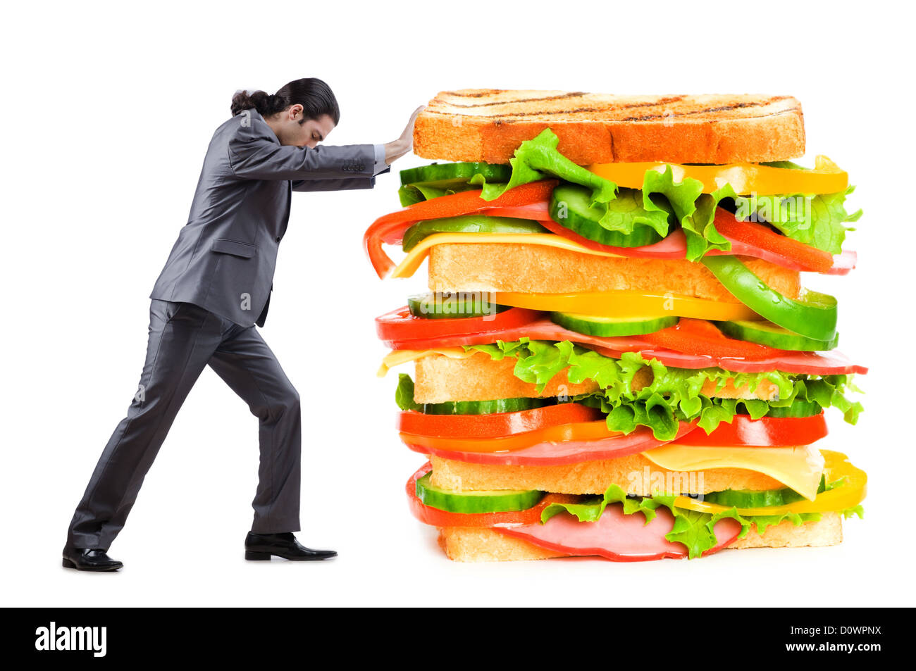 Man and giant sandwich on white Stock Photo - Alamy