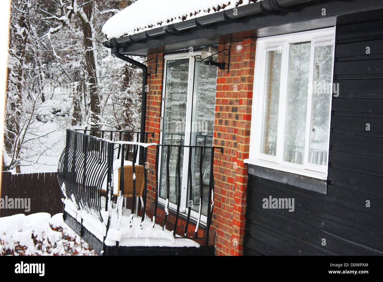 House covered in snow during winter Stock Photo - Alamy