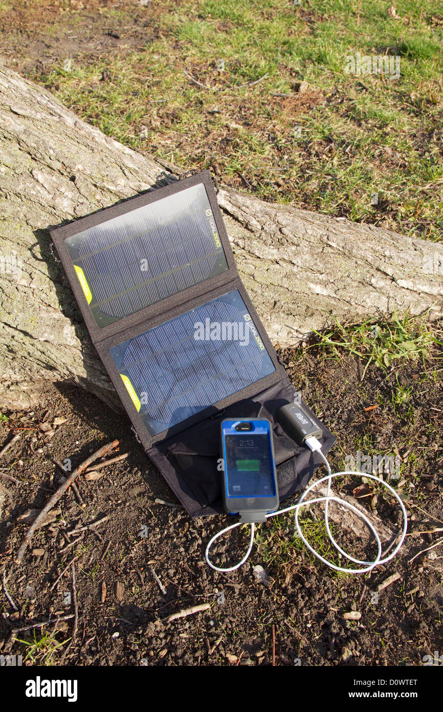 Portable solar cell for recharging mobile devices Stock Photo - Alamy