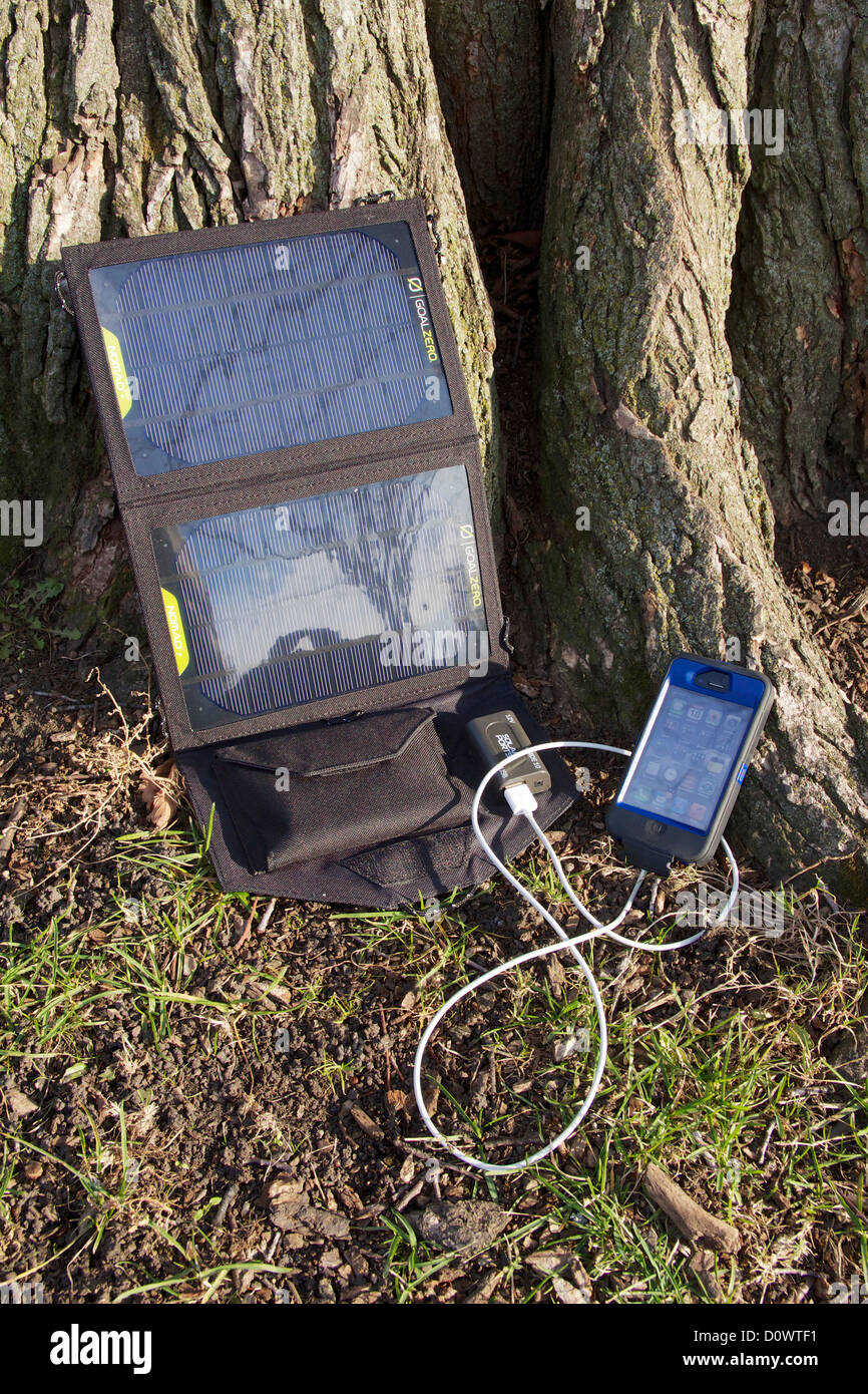 Portable solar cell for recharging mobile devices Stock Photo - Alamy