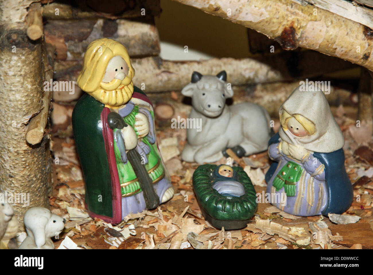 Crib with the nativity scene with figurines Stock Photo - Alamy