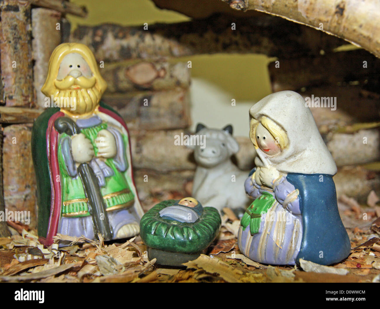 Crib with the nativity scene with figurines Stock Photo - Alamy