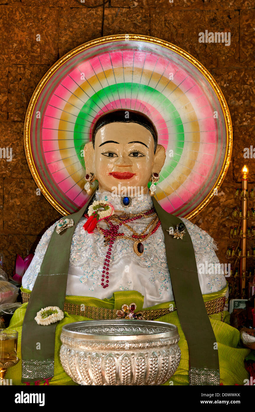 Sculpture of Lady Penh, which gave Phnom Penh its name, in a shrine at ...