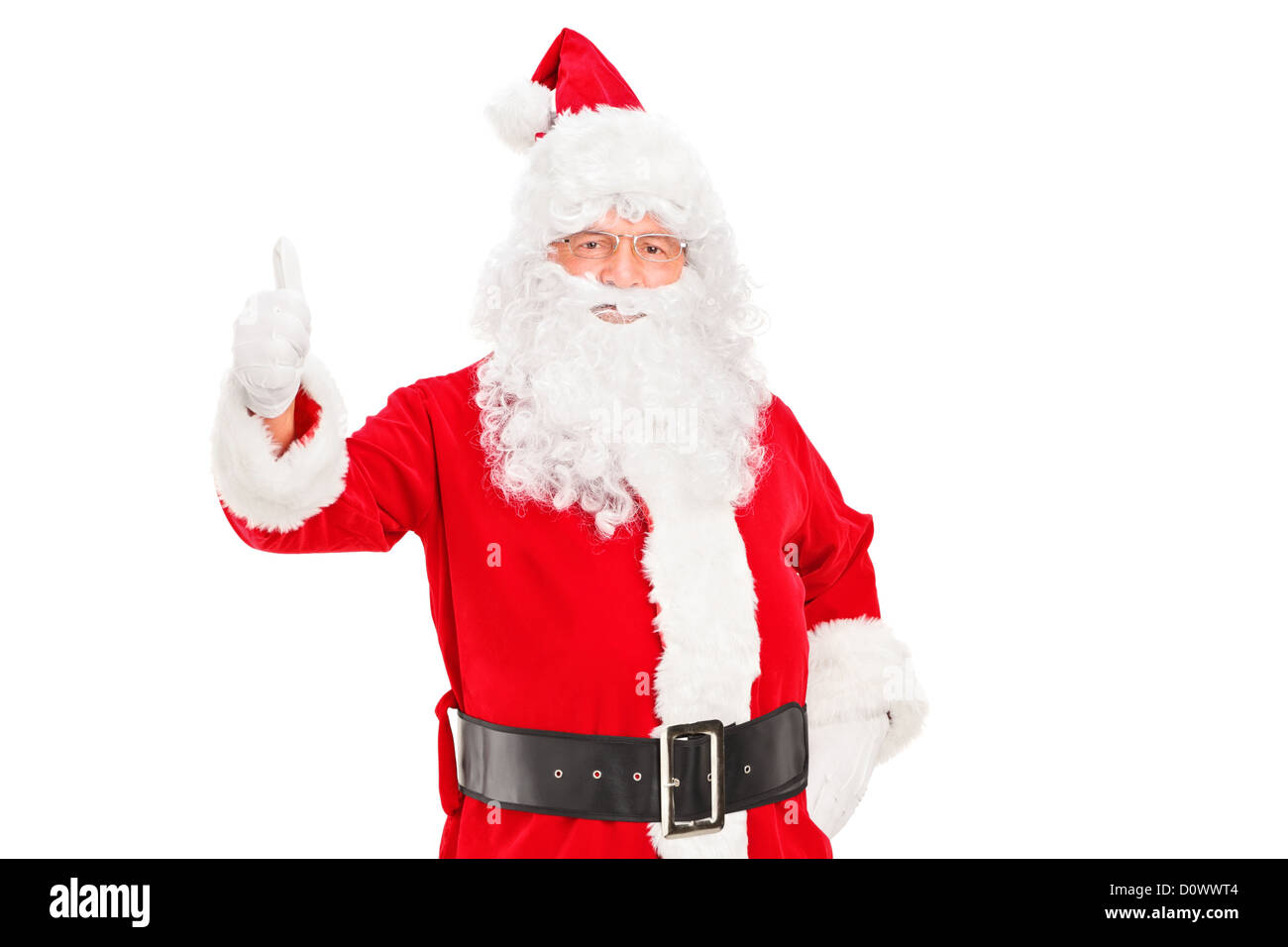 A happy Santa claus standing and giving a thumb up isolated on white ...