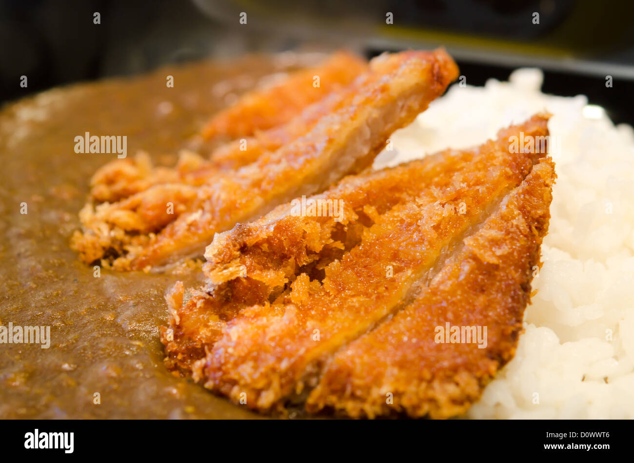 Japanese breaded deep fried pork cutlet (tonkatsu) served with steamed ...