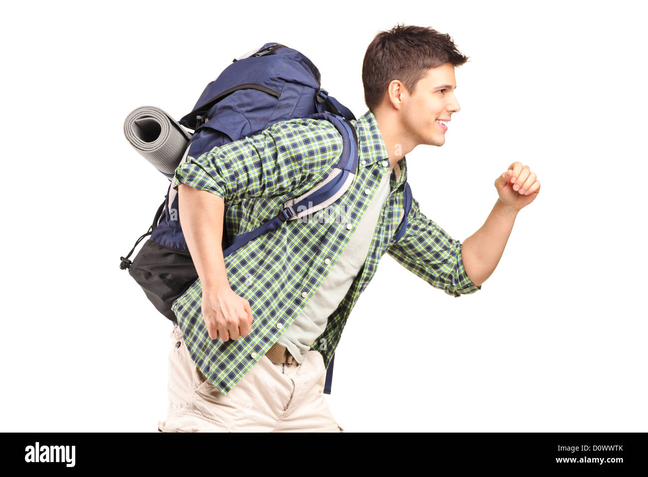 A young hiker with backpack running isolated on white background Stock ...