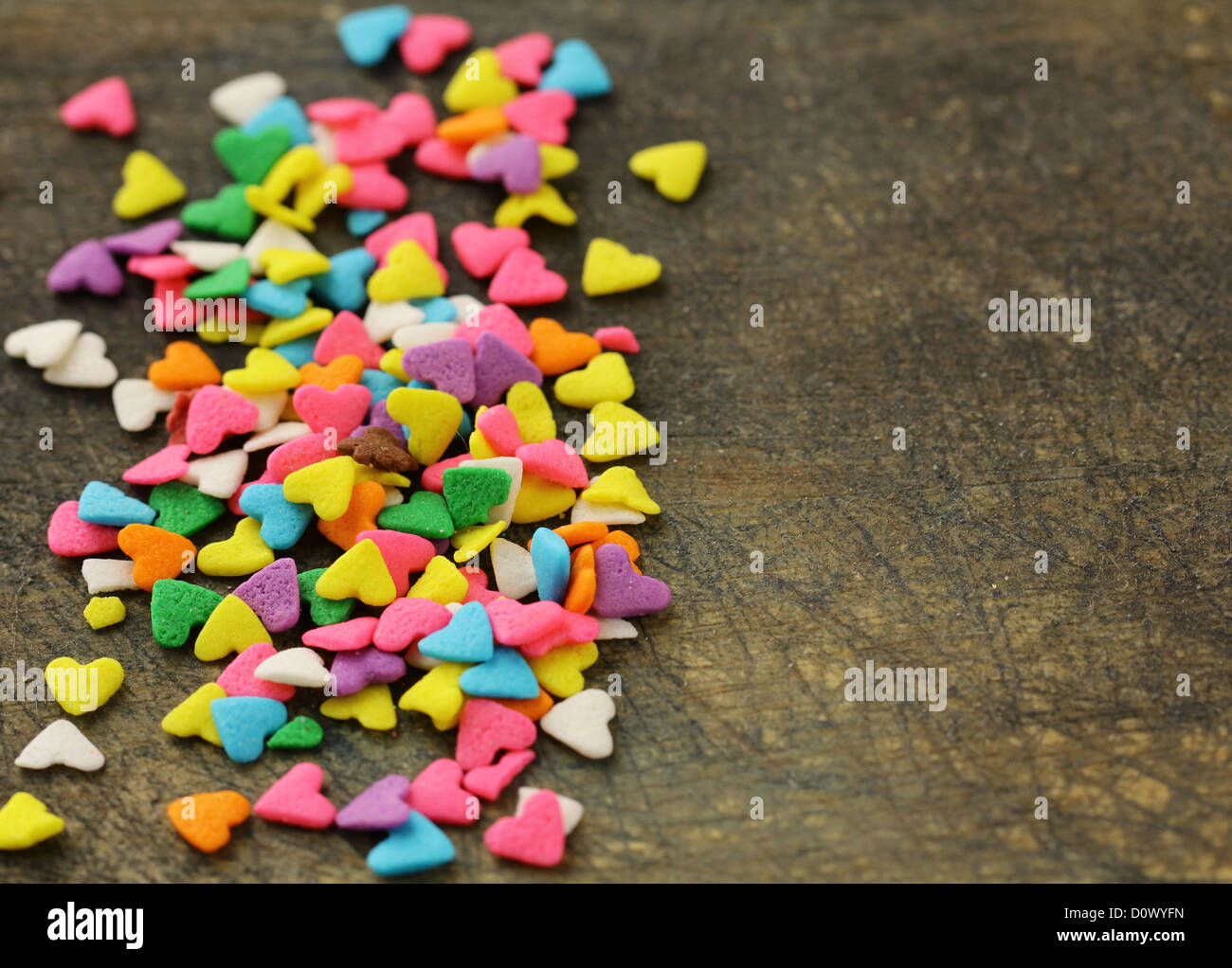 small sugar candy in the form of hearts Stock Photo - Alamy