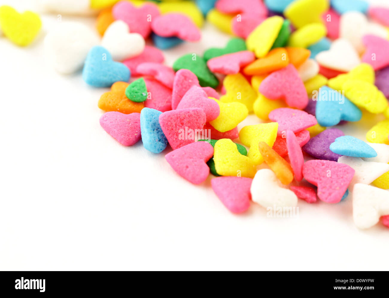 small sugar candy in the form of hearts Stock Photo - Alamy