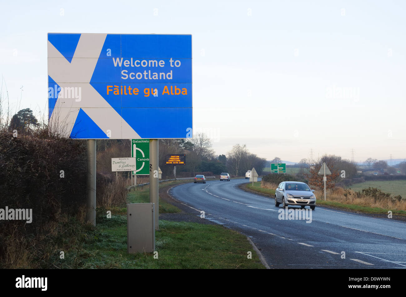 Welcome to Scotland road signpost in English and Gaelic on the border ...