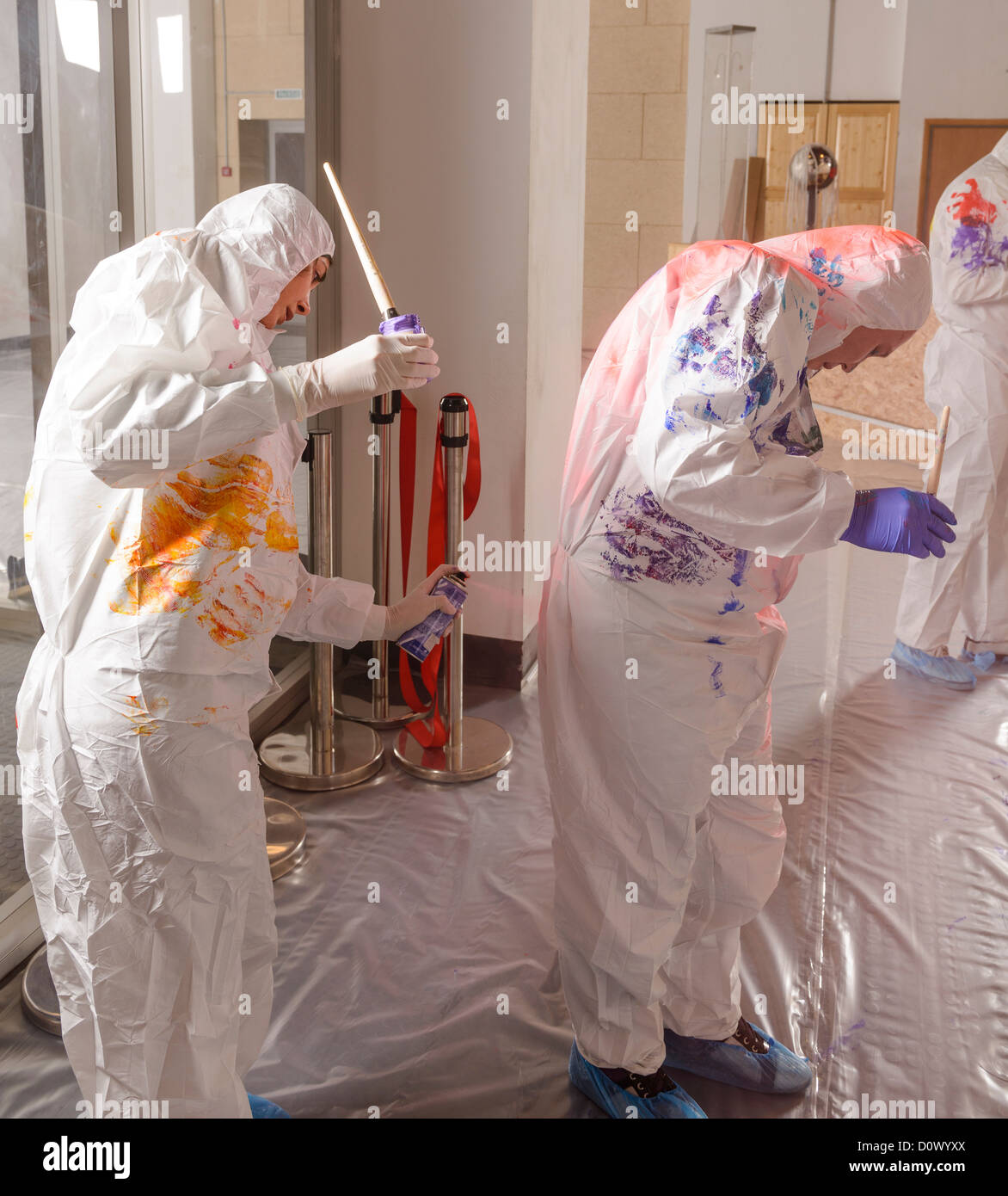 People having fun during art therapy session drawing paint Stock Photo ...