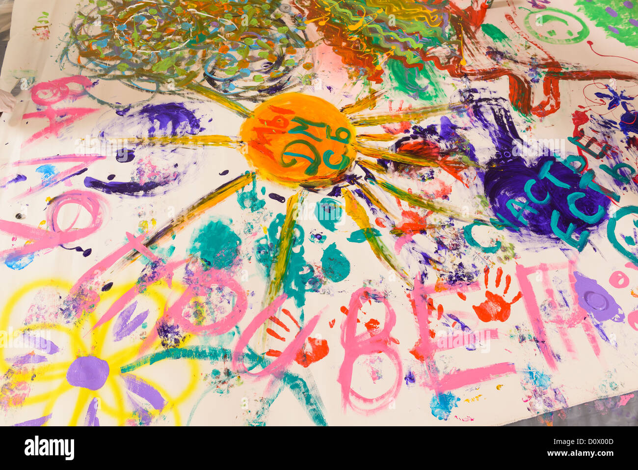 People having fun during art therapy session drawing paint Stock Photo ...