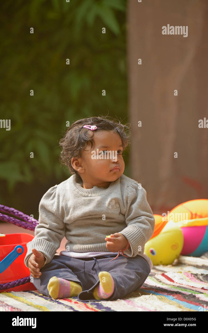 Cute south asian (Indian) baby girl playing with her toys Stock Photo ...