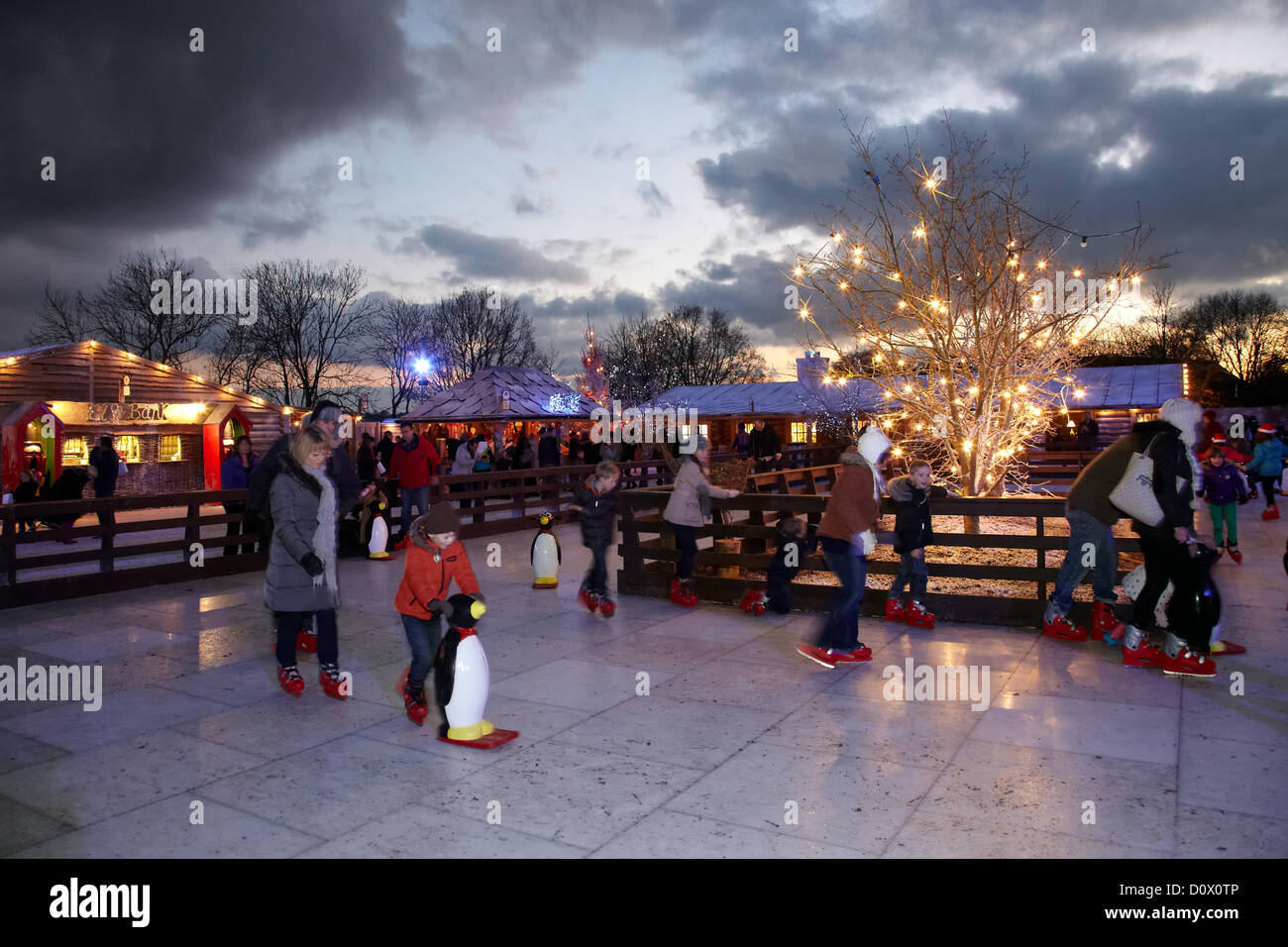 Evening on the ice rink in the Elf village. Bewl Water, Kent, December ...