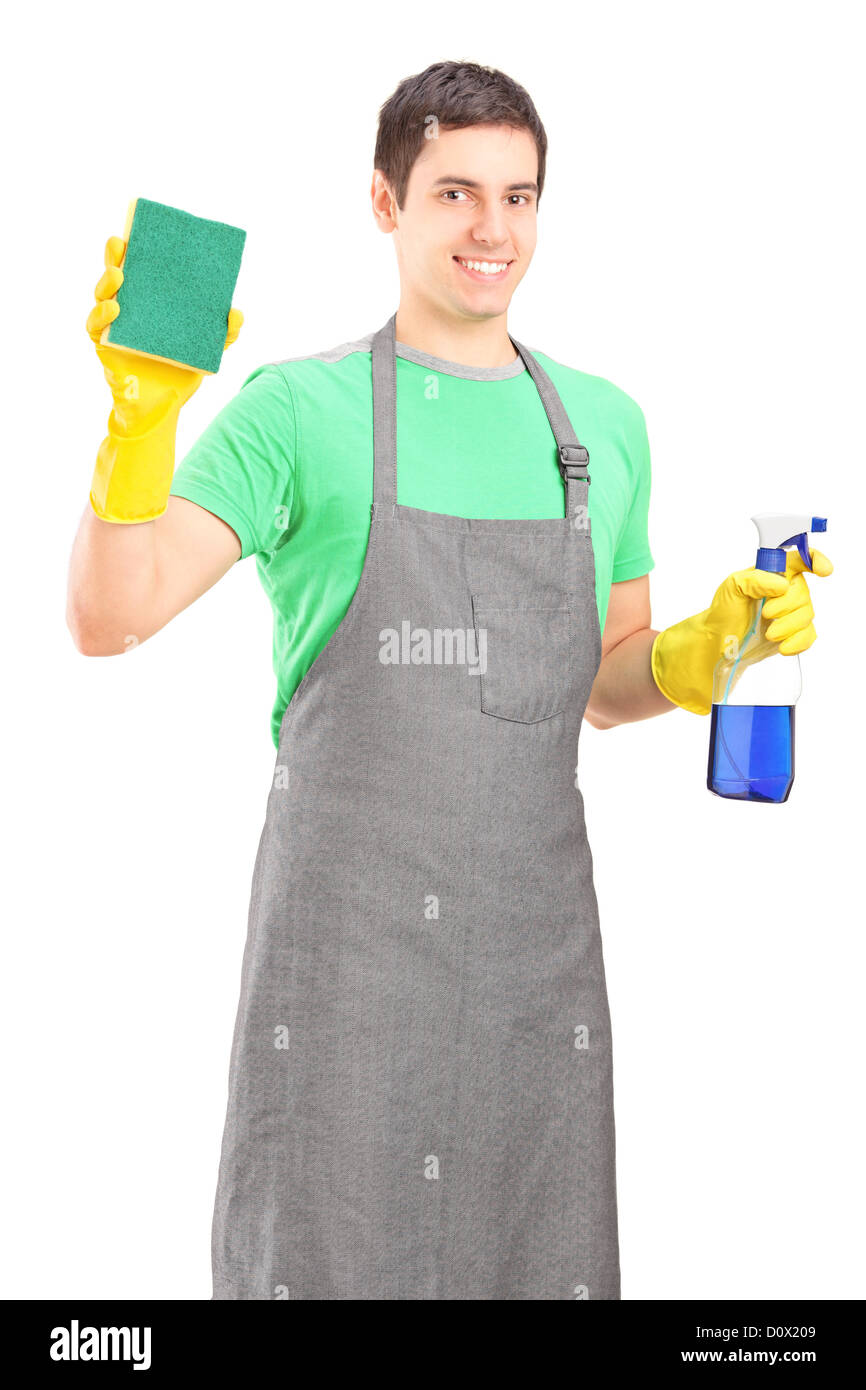 A smiling male cleaner holding cleaning equipment isolated on white ...