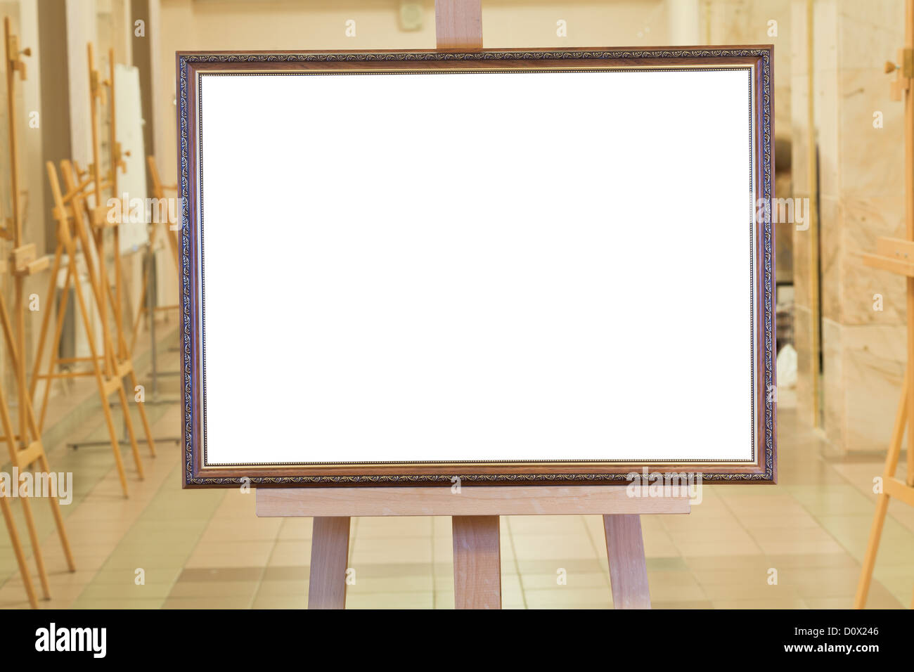 big picture frame with white cut out canvas on easel in art gallery ...