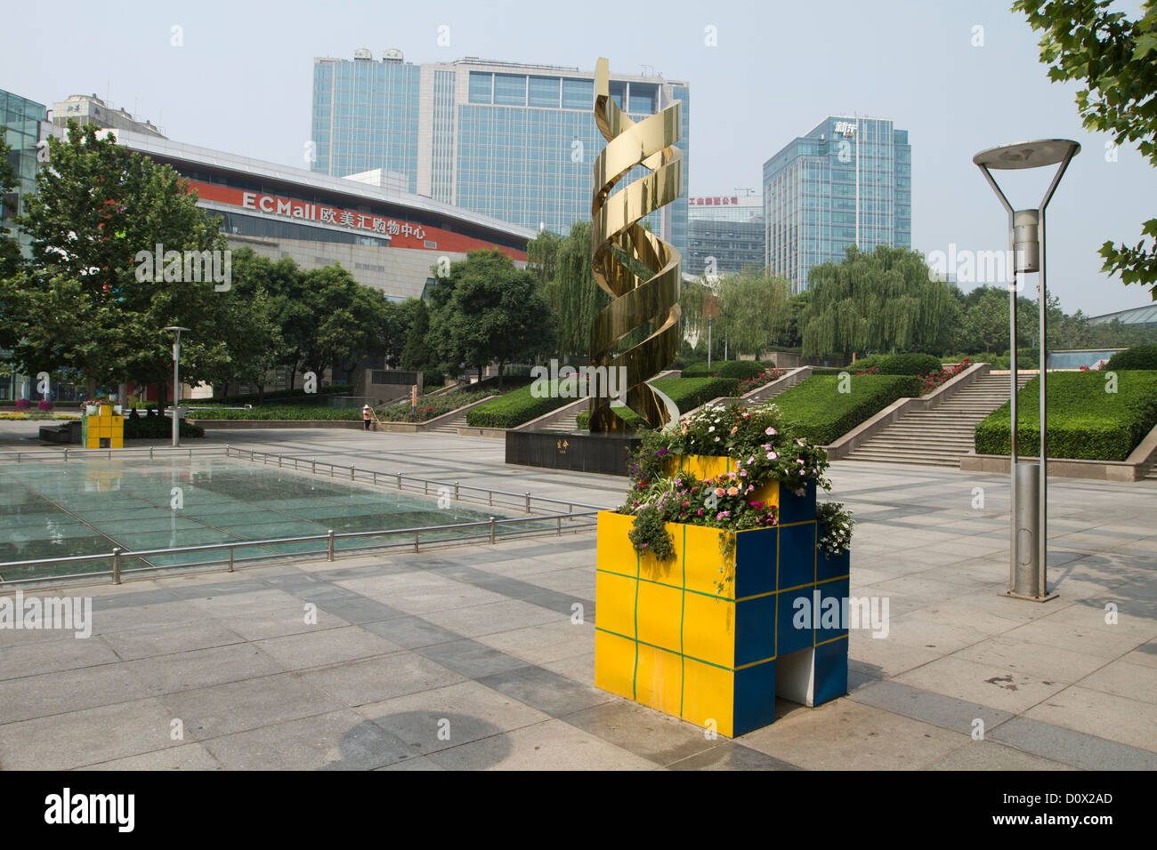 An exterior view of the sculptures and square in front of the EC Mall ...