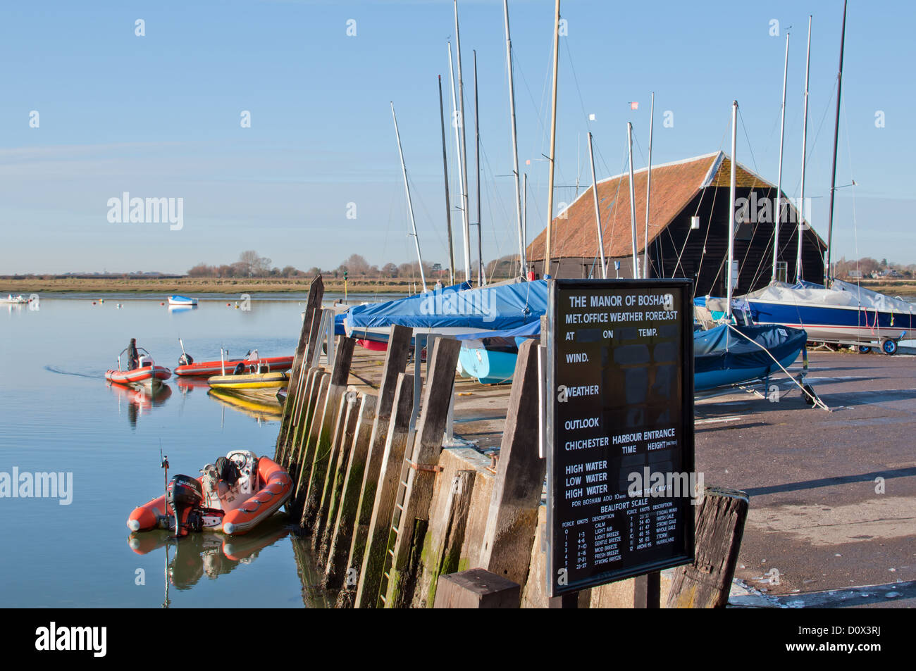 Bosham quay in west sussex showing activity going on in the water with ...