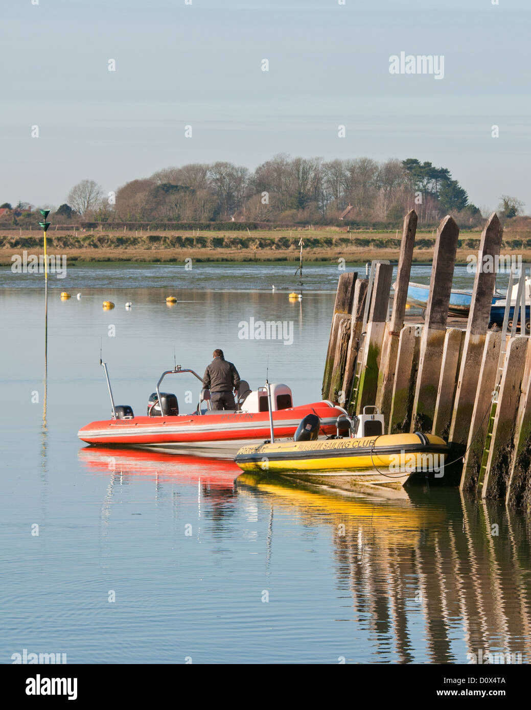 Man dinghy outboard hi-res stock photography and images - Alamy