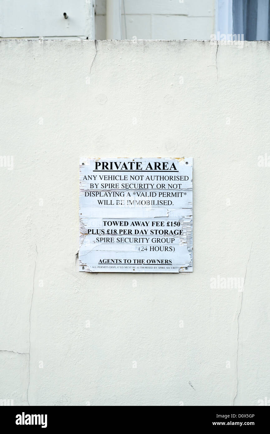Old scruffy private parking sign Stock Photo - Alamy