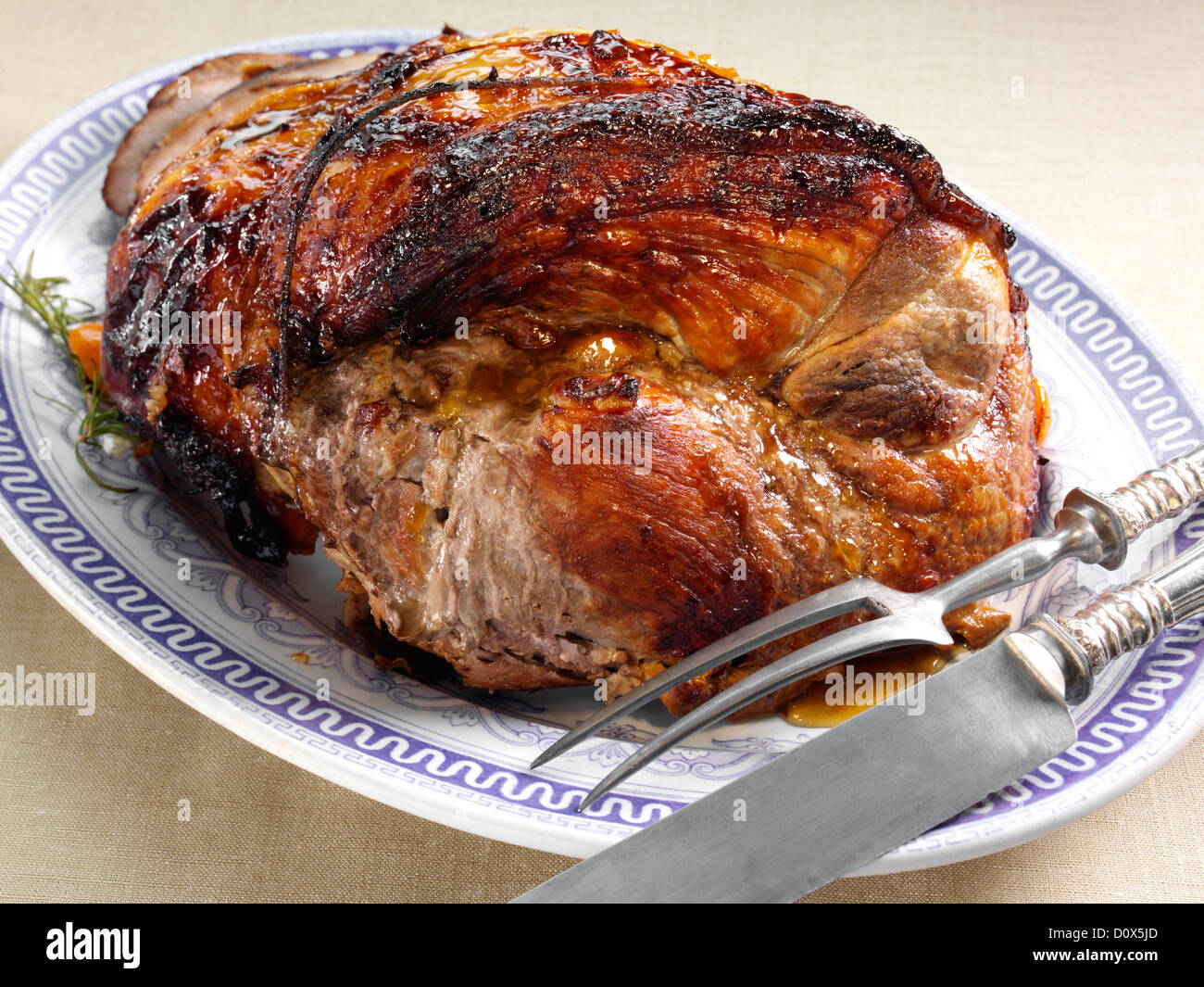 Leg of pork whole rolled boned glazed joint Stock Photo - Alamy